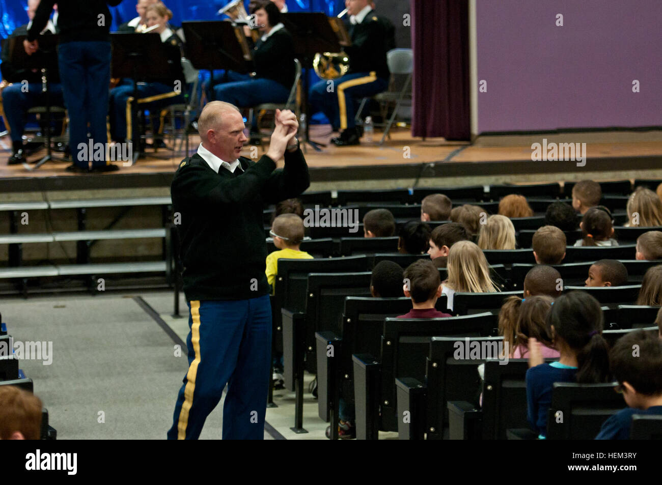 Sgt. 1st Class Thomas Babbit, drummer for the 56th Army Band, claps his ...