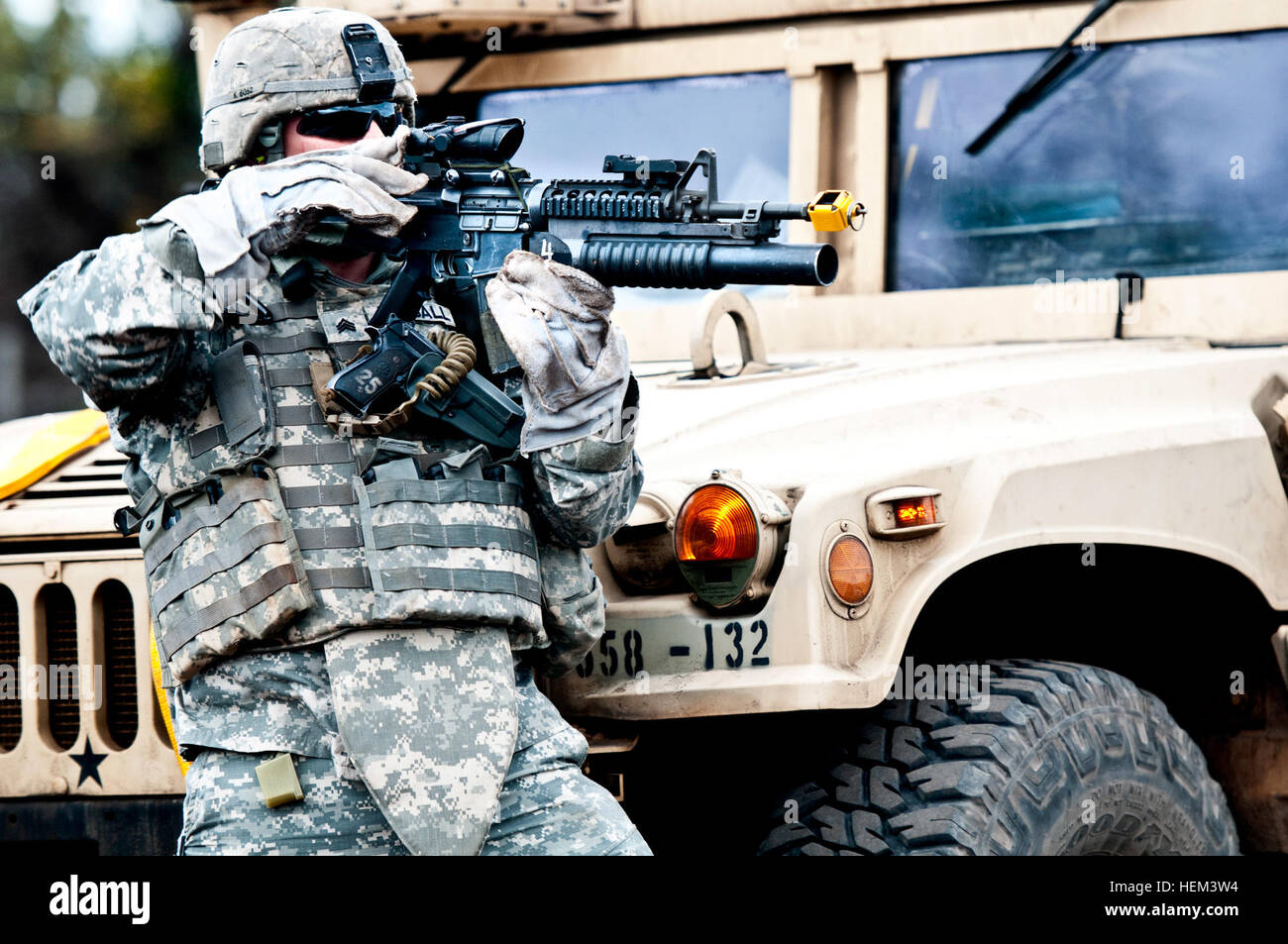 A military policeman assigned to the 558th Military Police Company ...