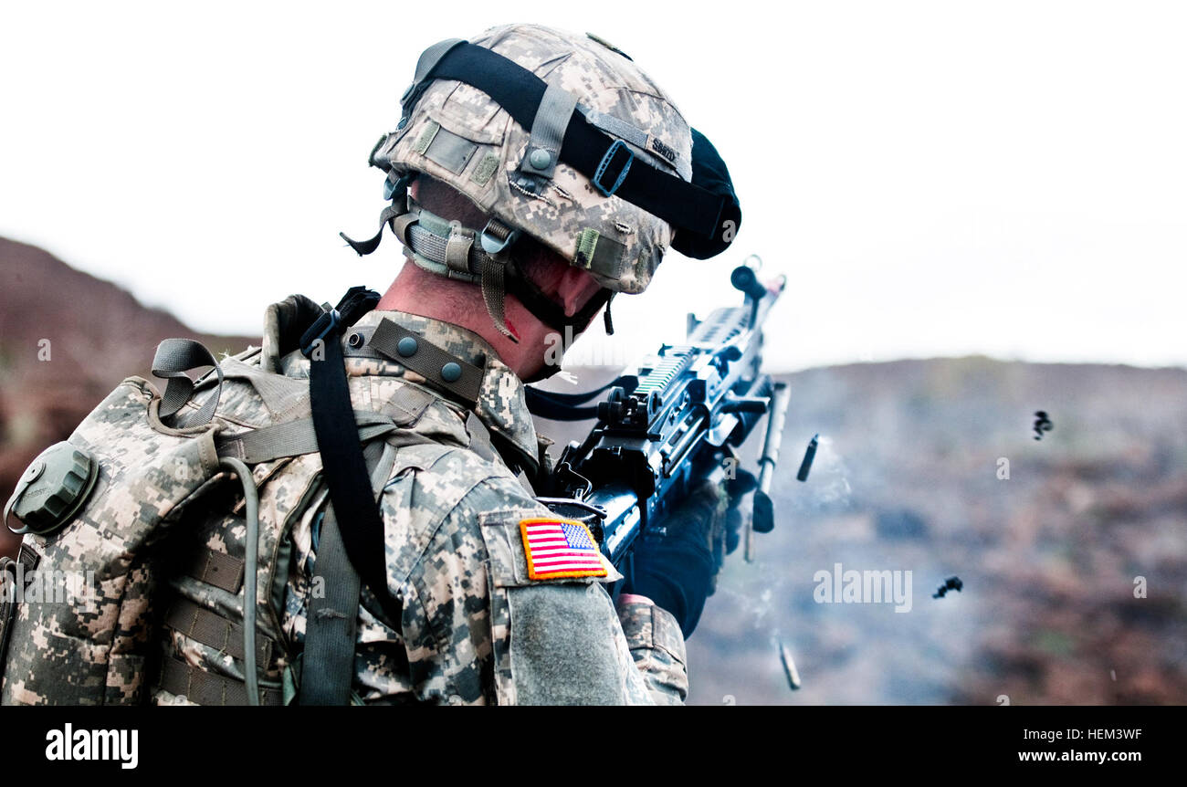A military policeman assigned to the 558th Military Police Company ...