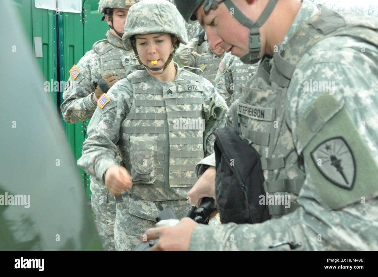Indiana Army National Guard Sgt. Mollie Pitz, Indianapolis, receives an ...