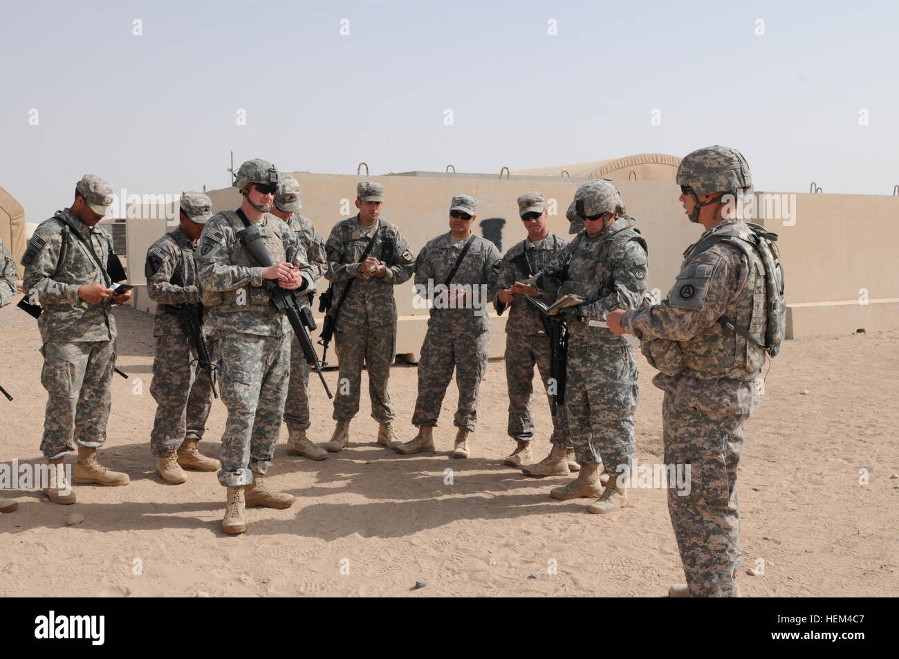 Staff Sgt. Mark Paixao (right), Third Army small group leader and ...