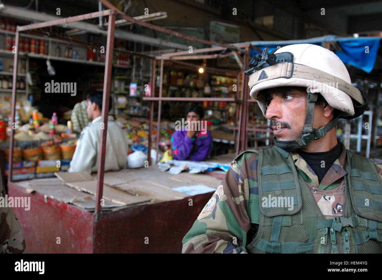 BAGHDAD, Iraq - An Iraqi Soldier scans the area Feb. 21, 2007, in the ...