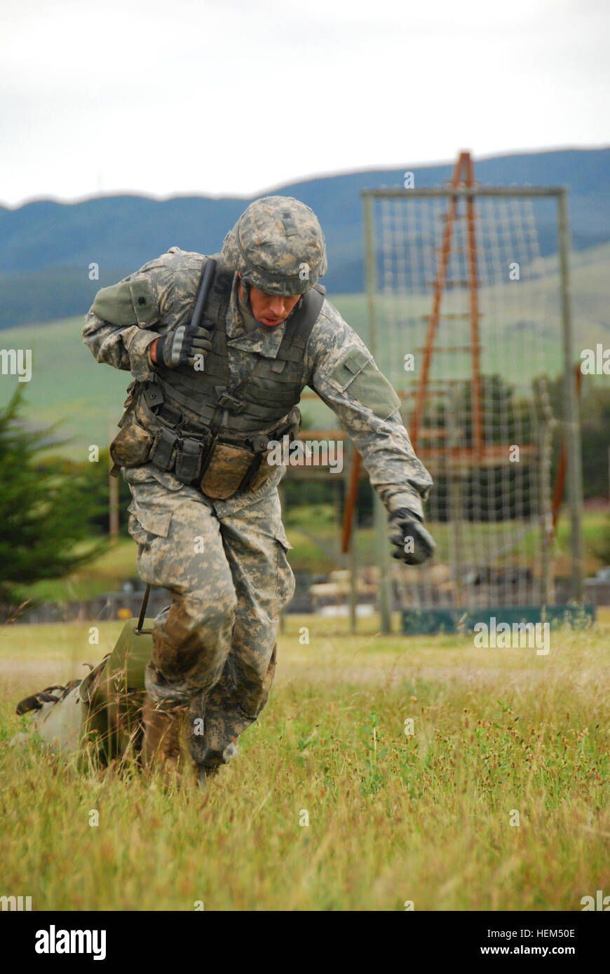 Spc. Benjamin Mason, Arizona Army National Guard, finishes the final ...