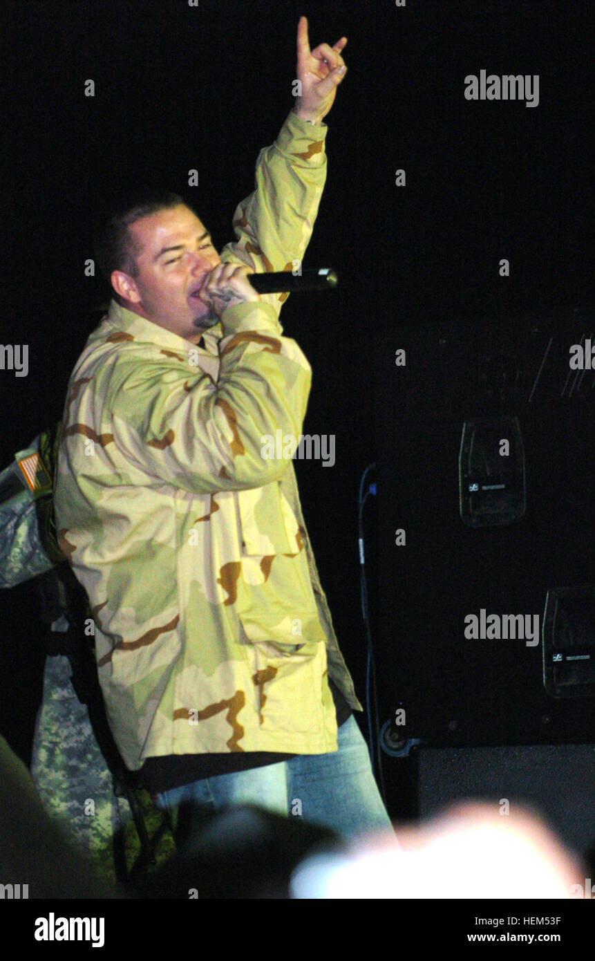 Houston-based rapper Paul Wall, full of Texas pride, throws a "Hook 'em ...