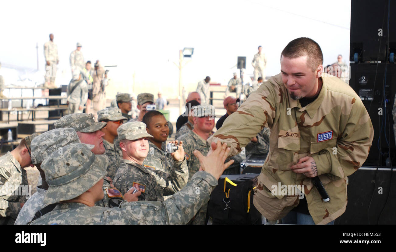 CAMP STRIKER, Iraq — Rapper Paul Wall greets soldiers at the Moral ...