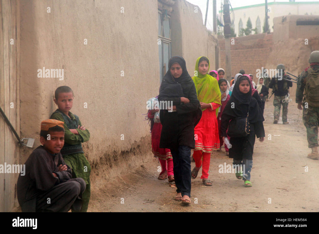 Afghan children watch as Afghan National Army soldiers from 5th ...