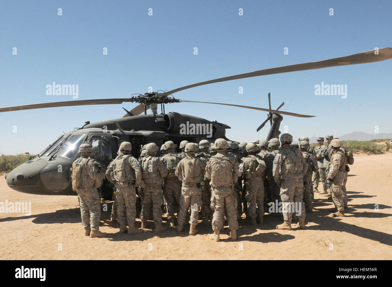 Soldiers of 1st Squadron, 1st Cavalry Regiment, 2nd HBCT, 1st AD listen ...