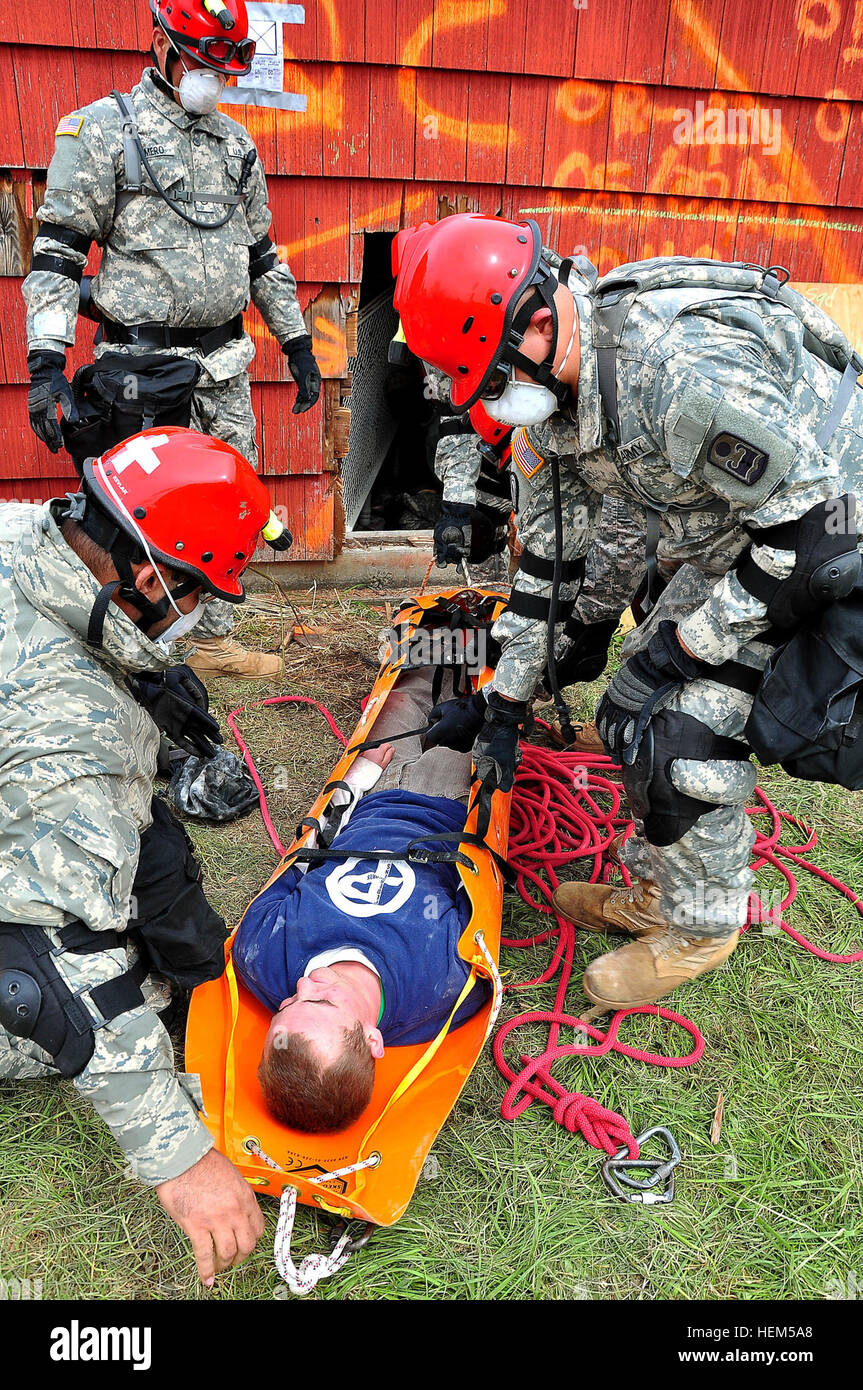Members of the Search and Extraction Team from the PR-CERFP pull a ...