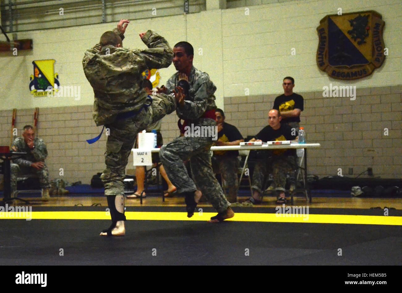 One opponents executes a kick to the body to the other during the 2012 ...