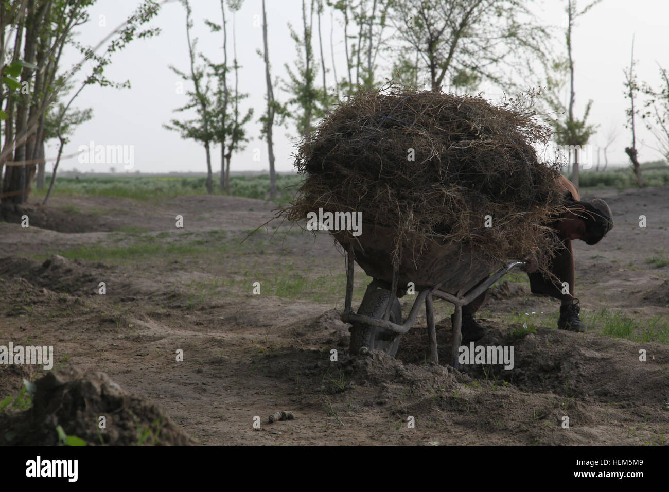 Wheelbarrow military hi-res stock photography and images - Alamy