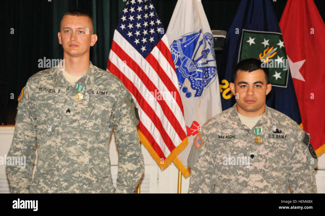 (From left) Sgt. Michael Turner and Spc. David Nakasone stand before ...