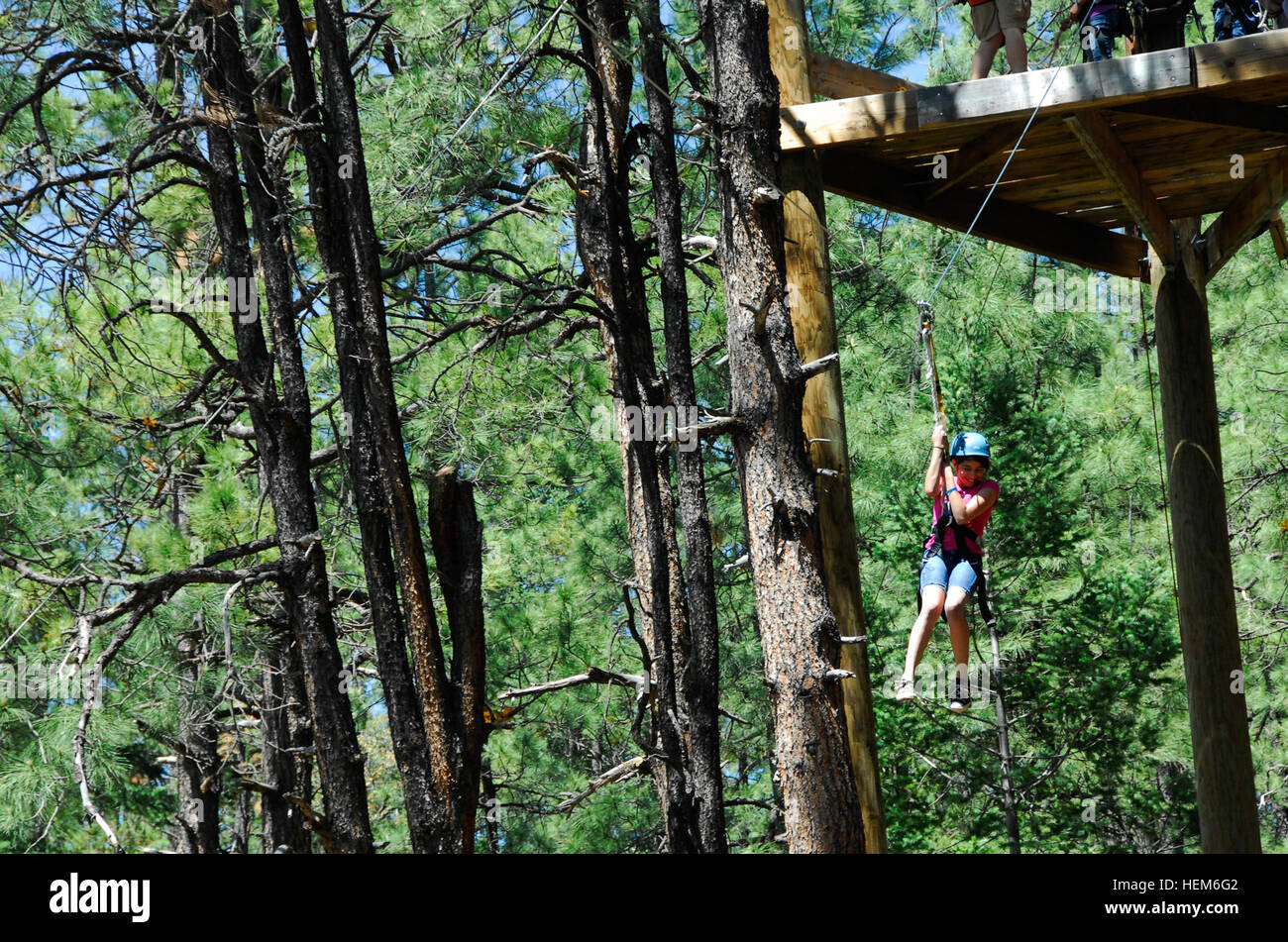 A student from Mark T. Atkinson Middle School slides down a 150-yard ...