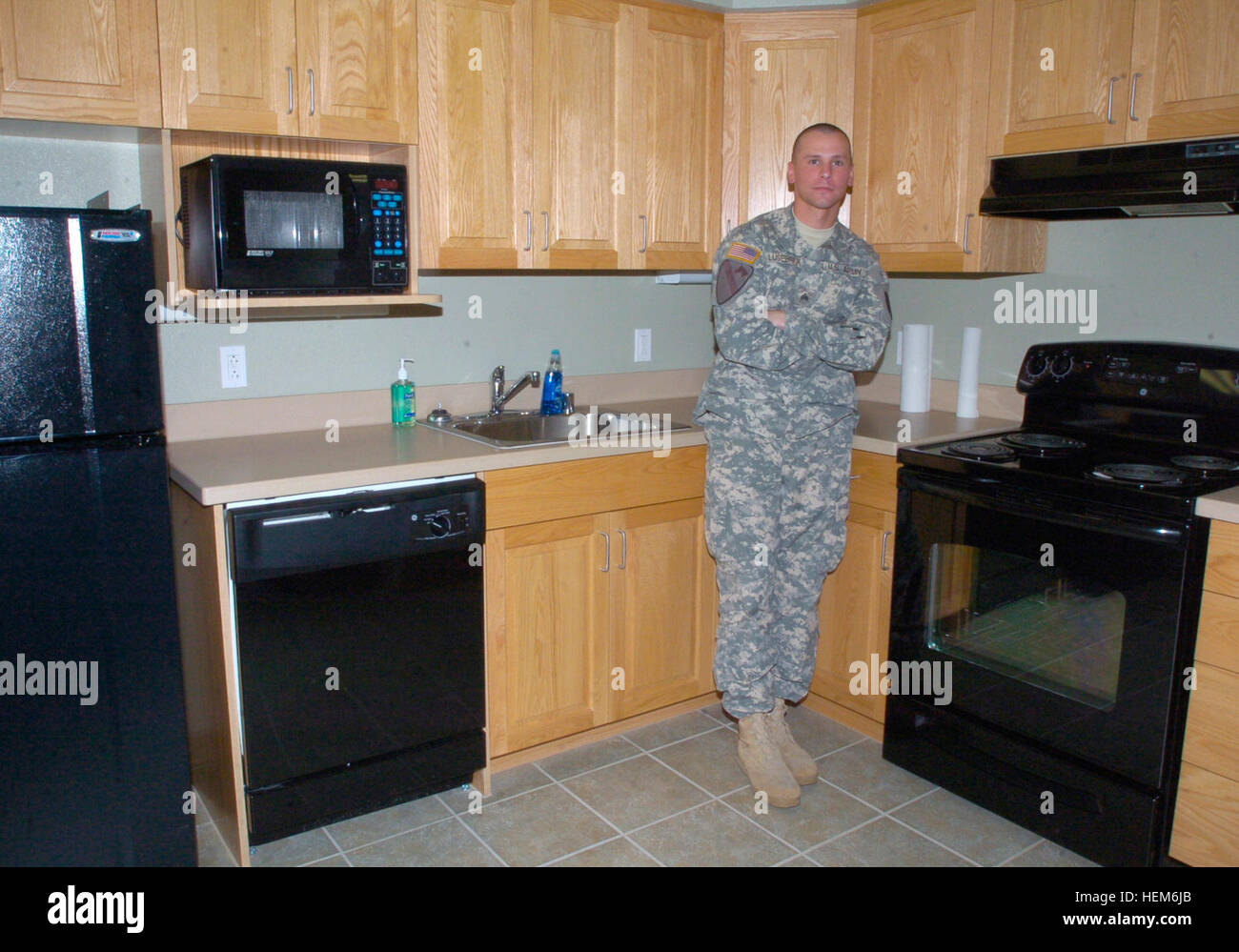 The new barracks include a full kitchen, stocked with two four-piece ...