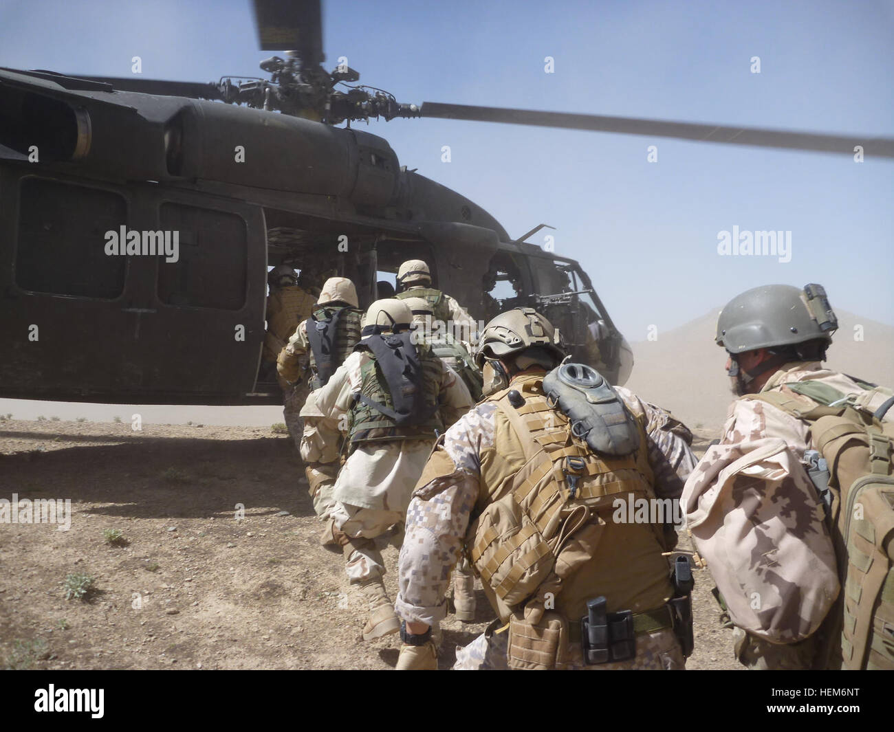 Lithuanian and Latvian soldiers with Combined Task Force 77 and Afghan ...