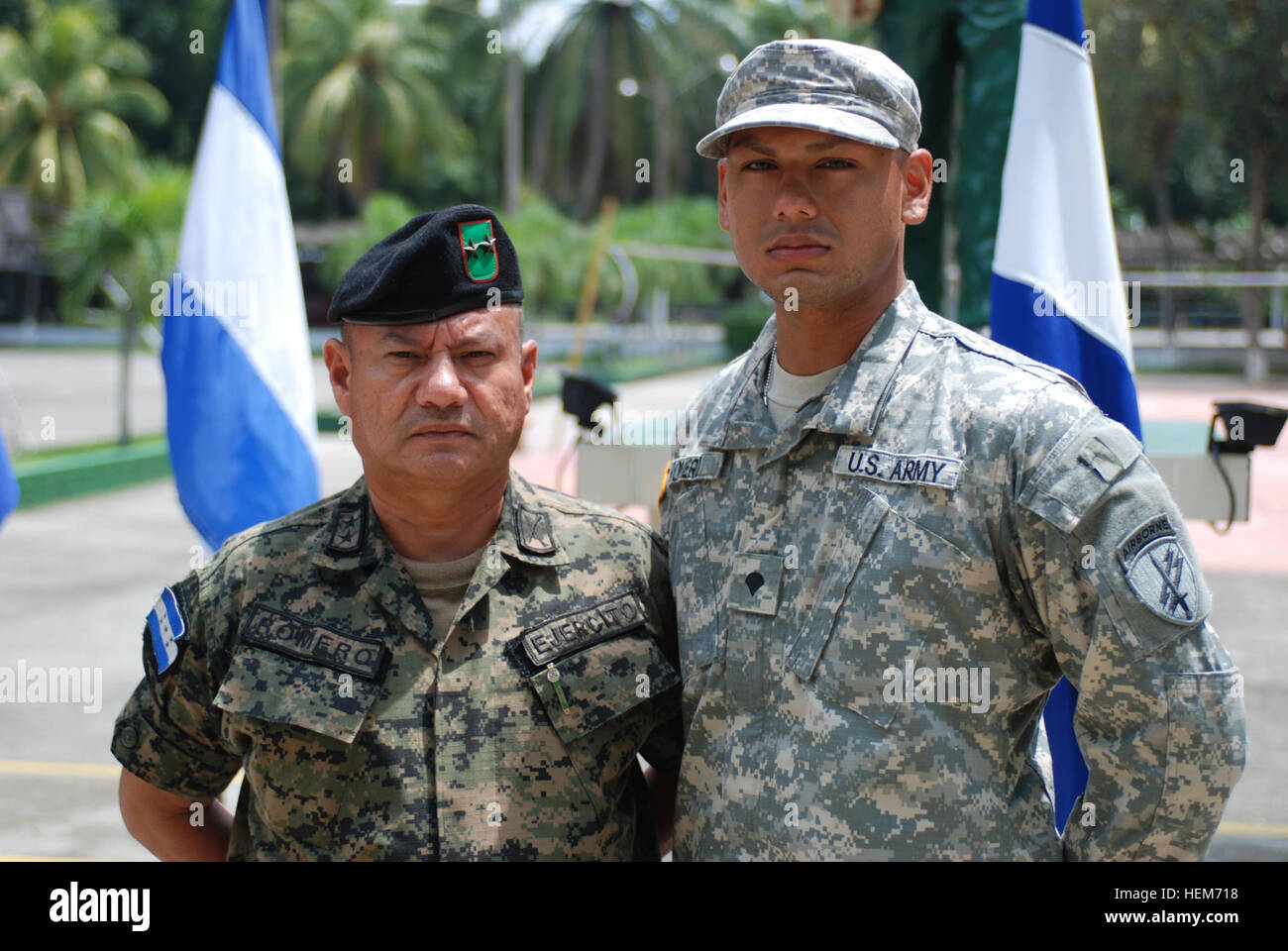 Spc. Javier Romero (right), a civil affairs specialist with the 402nd ...