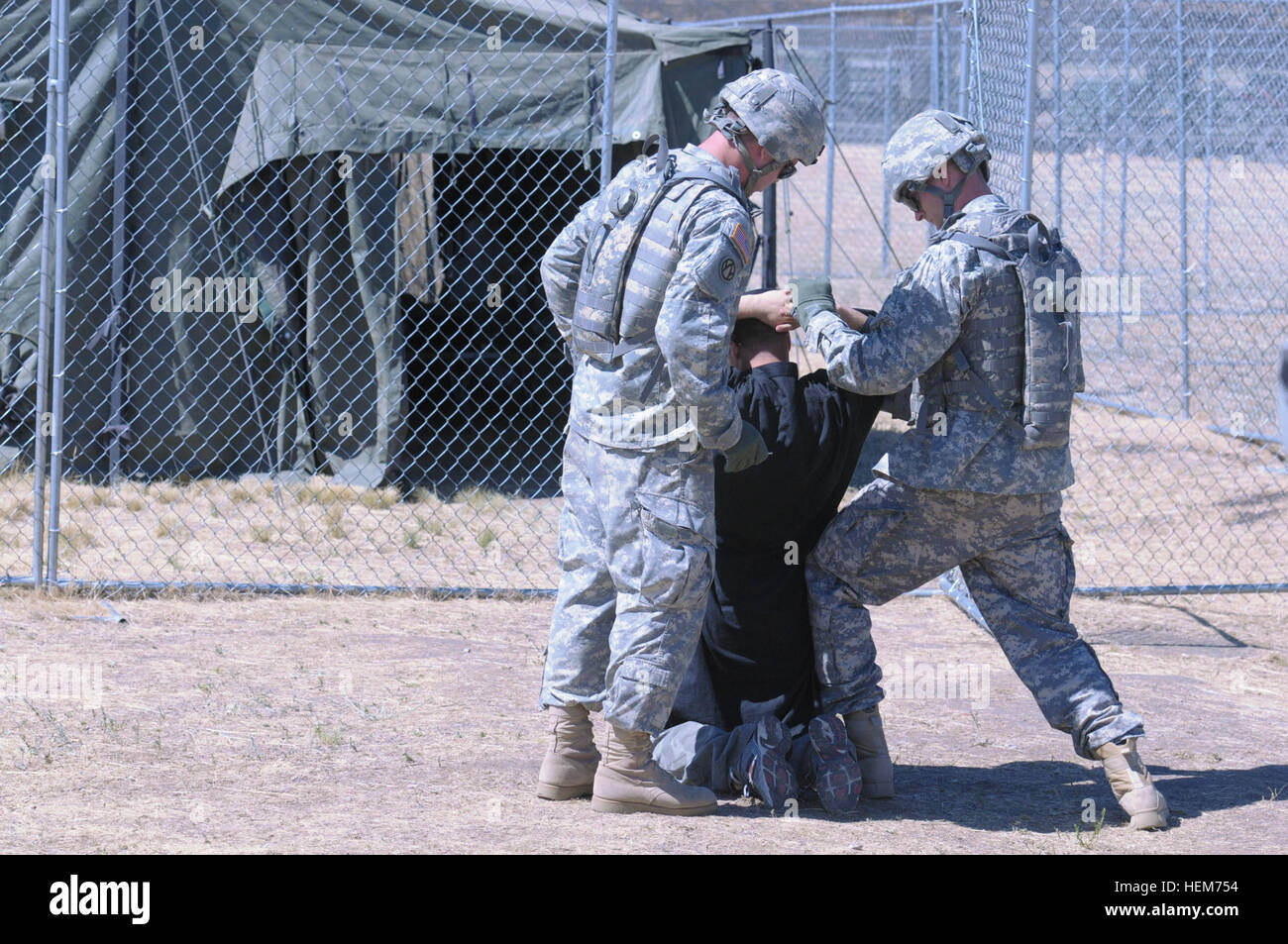 Spc. Matthew Adams and Spc. Joshua Dinesen with the 530th Military ...