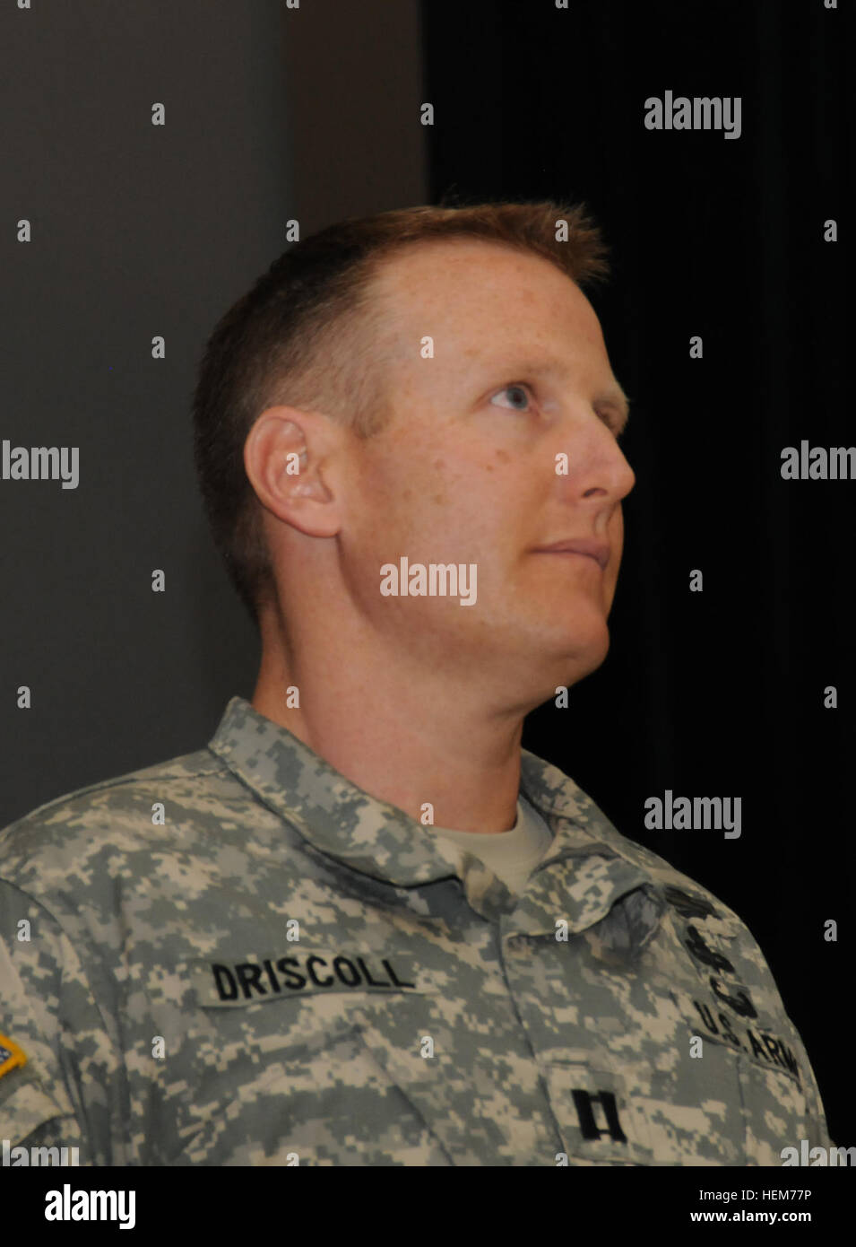 Capt. Tim Driscoll listens to the Silver Star citation highlighting his ...