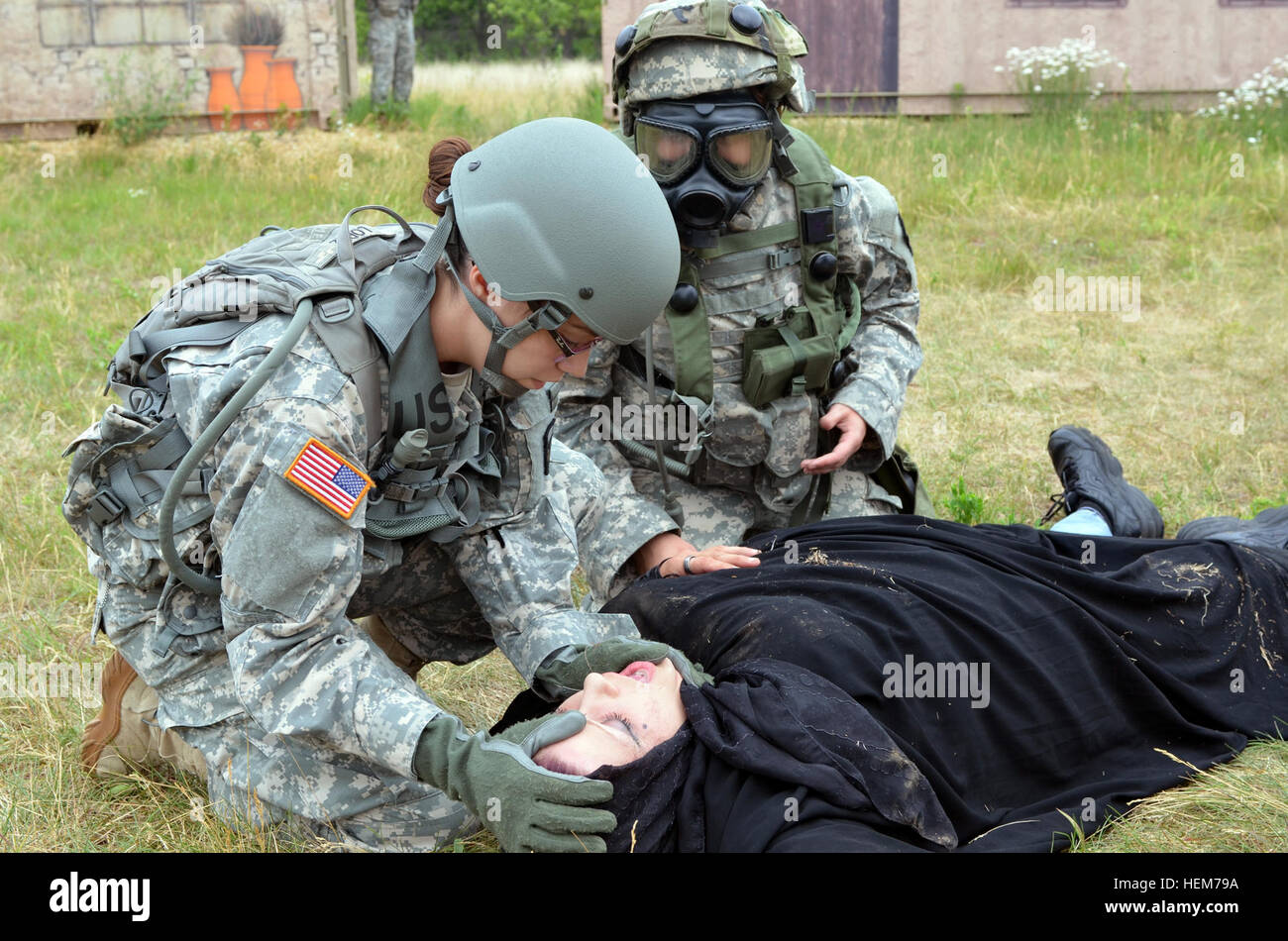 Army Reserve medics react to a simulated chemical attack during the ...
