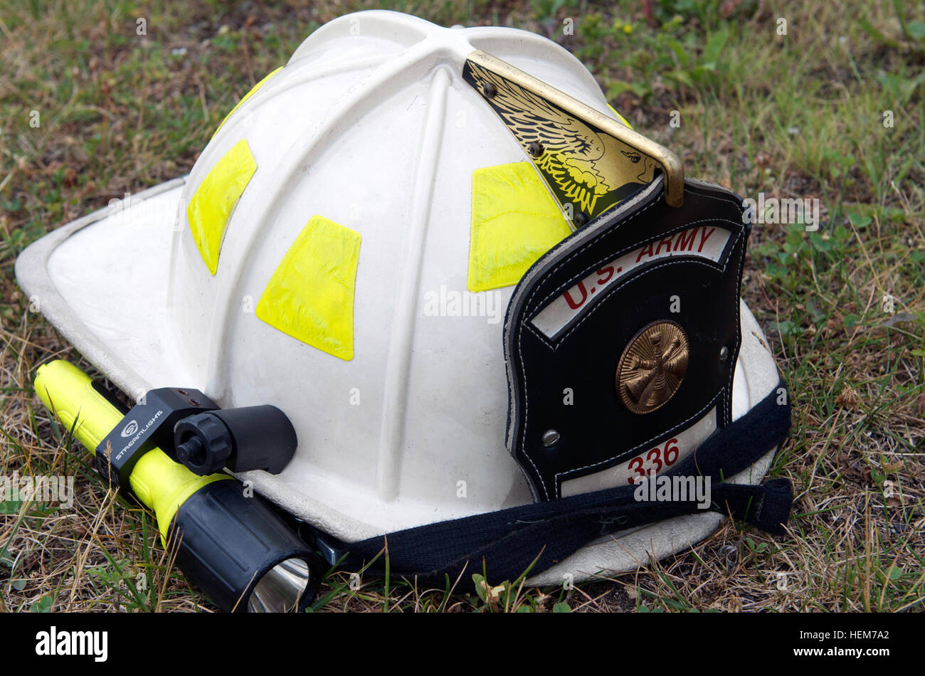 A fireman's hat from the 336th Engineer Firefighter's Detachment lays ...