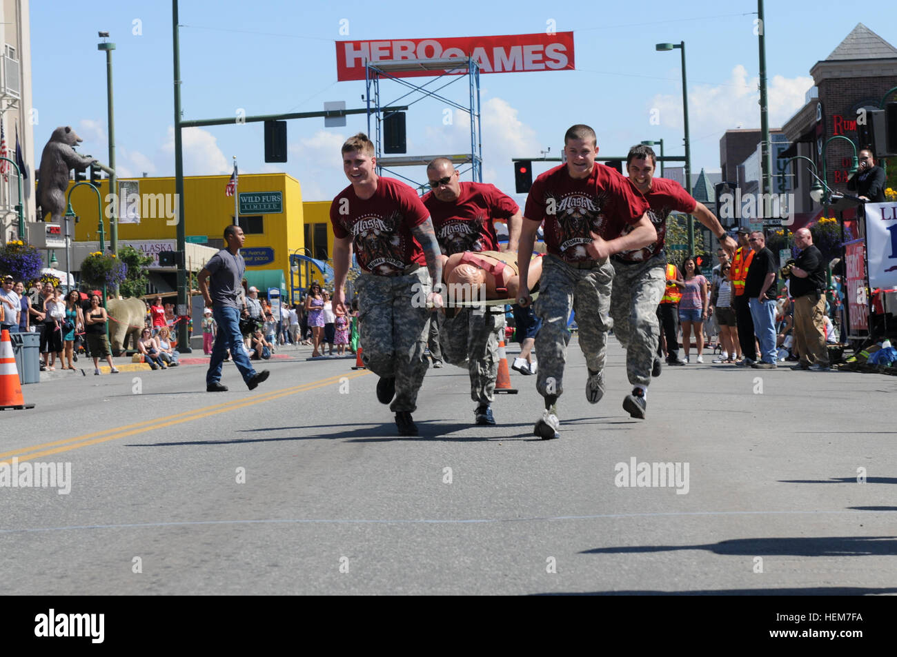 The Army National Guard "Predators of the North" race during the litter ...