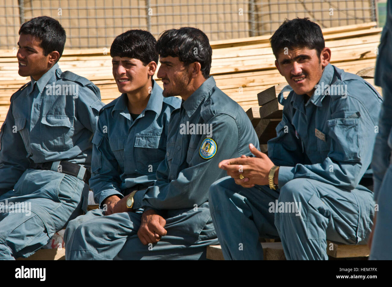 Afghan National Police (ANP) listen to an instructor during tactical ...