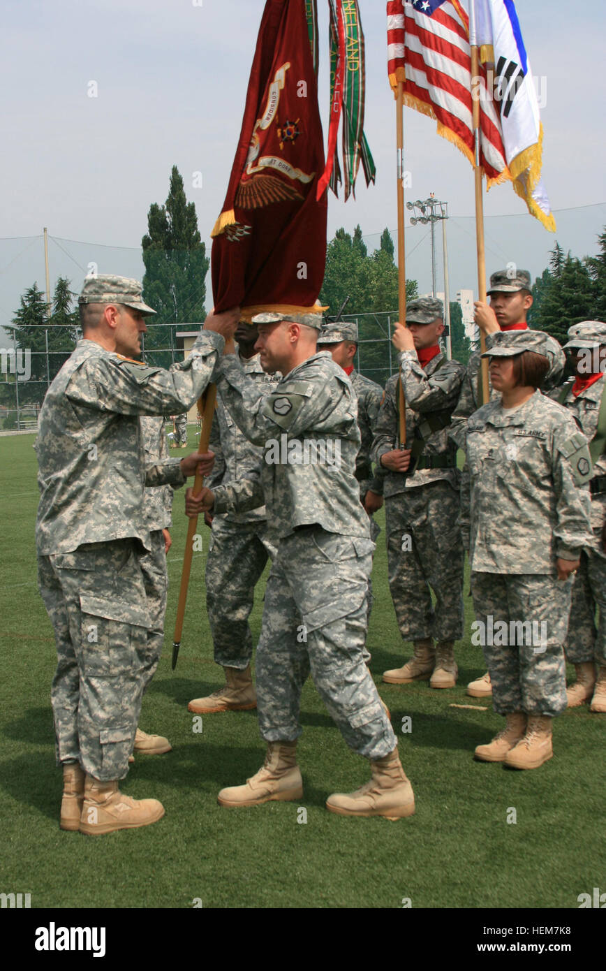 Lt. Col. Marc A. Mueller passes the 25th Transportation Battalion ...