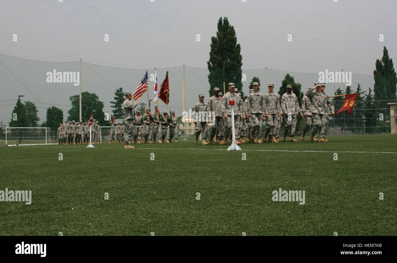 Lt. Col. Jin H. Pak salutes to his troop during pass and review portion ...