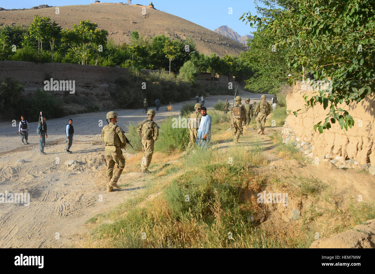 ISAF soldiers from C Troop, 1-14th Cavalry, 615th Civil Affairs Team ...