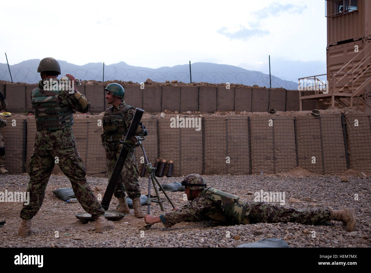 Afghan National Army soldiers prepare to fire illumination mortars ...