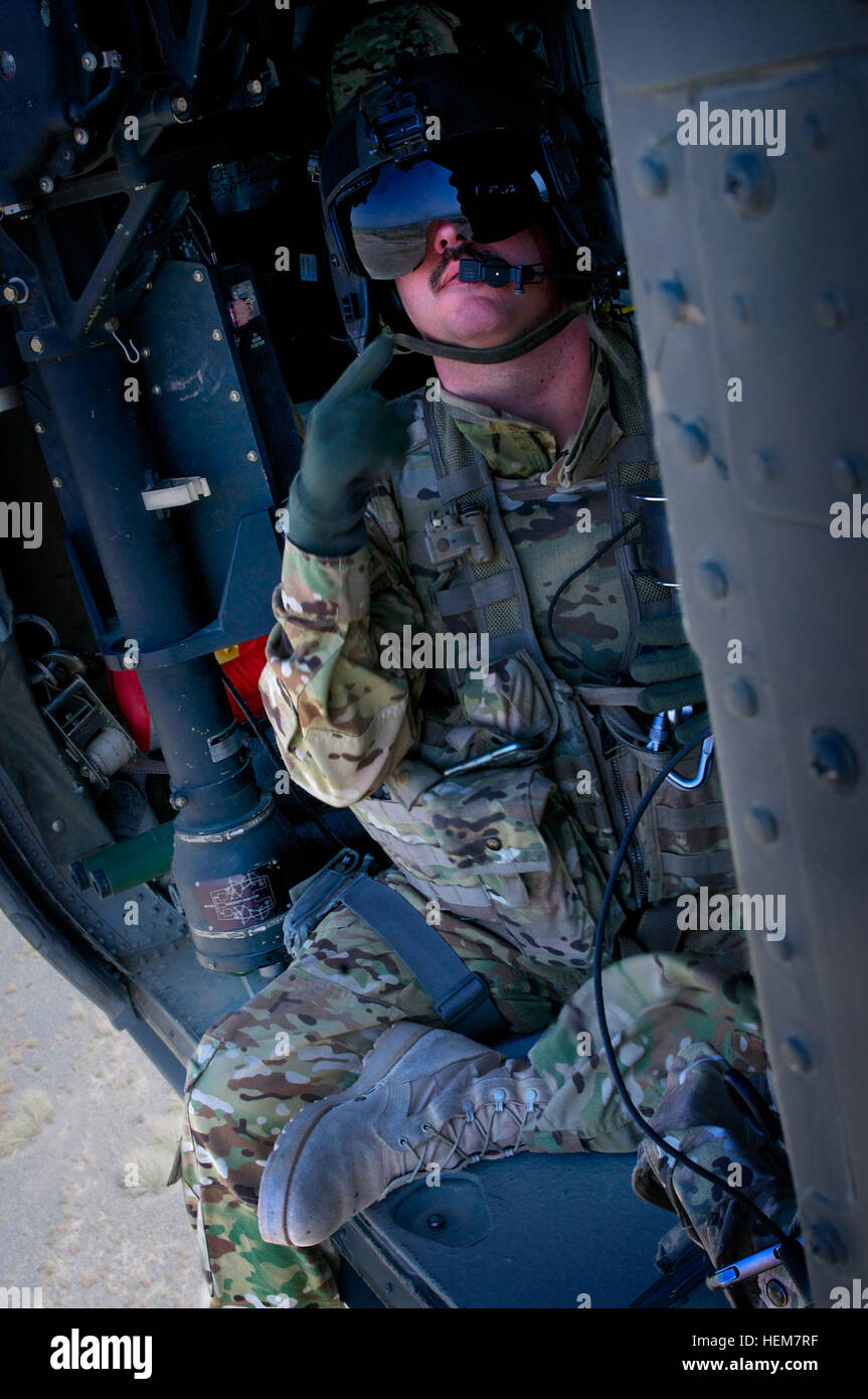 U.S. Army Staff Sgt. Patrick Rogers, of Galveston, Texas, directs ...