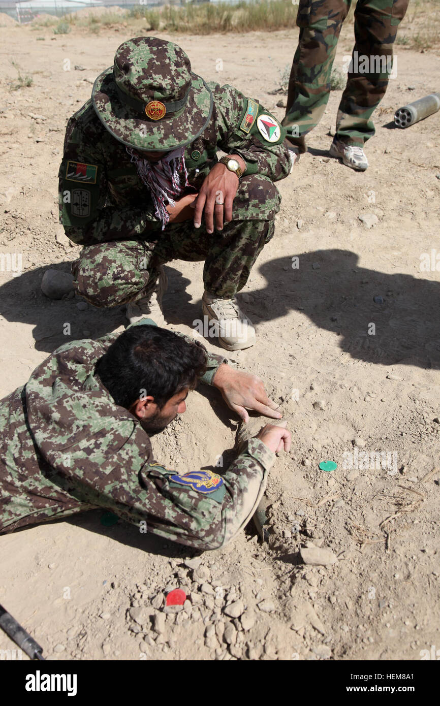 An Afghan National Army soldier, assigned to the route clearance ...