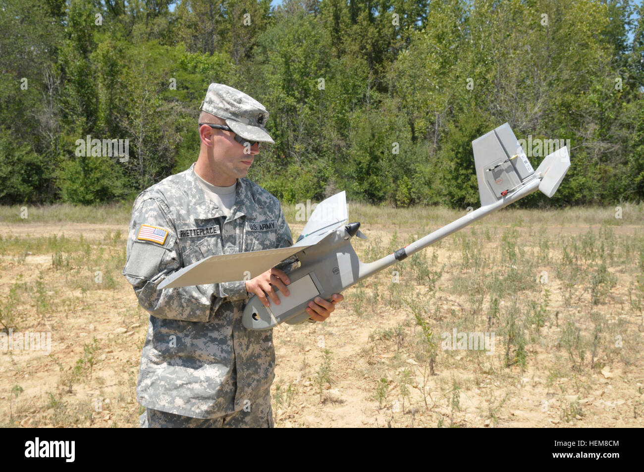 U.S. Army Staff Sgt. Jeremy Phetteplace of Manhattan, Kan., and a ...