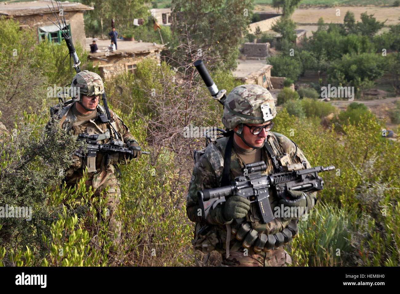 U.S. Army Spc. Timothy Rigg and U.S. Army Staff Sgt. Jon Phillips, both ...