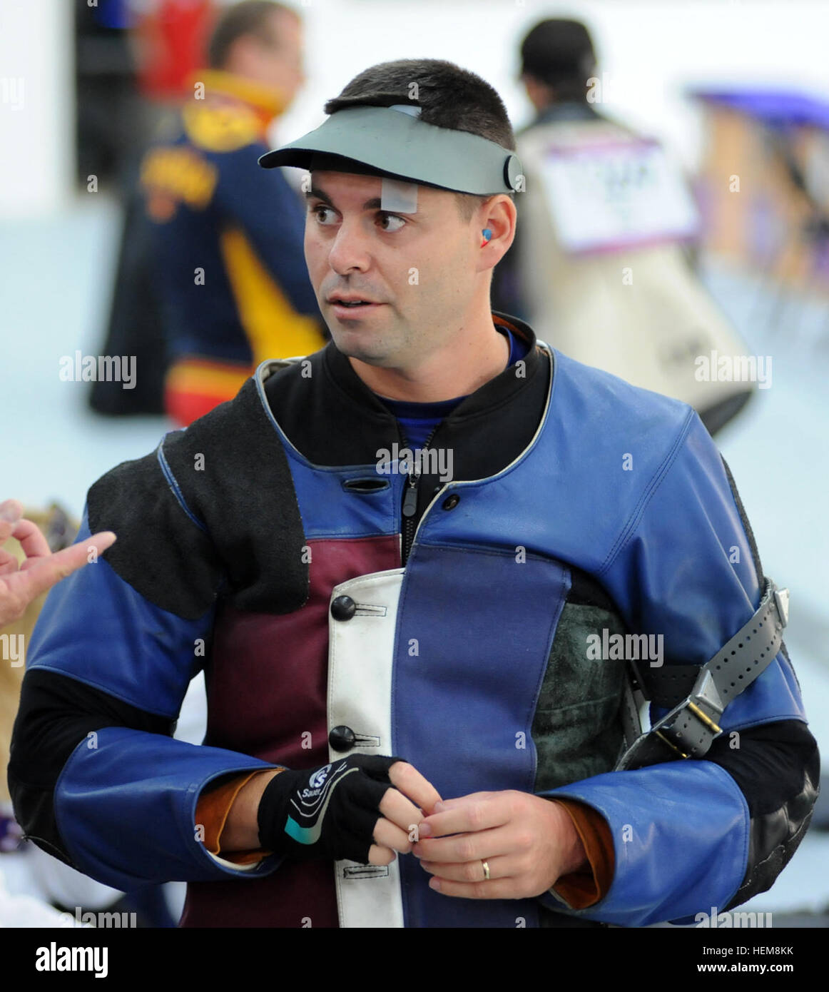 U.S. Army Marksmanship Unit shooter SSG Michael McPhail (right) talks ...