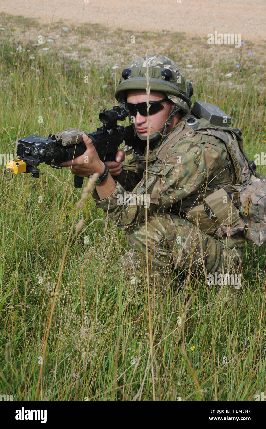 A Georgian army soldier from the 12th Light Infantry Battalion pulls ...