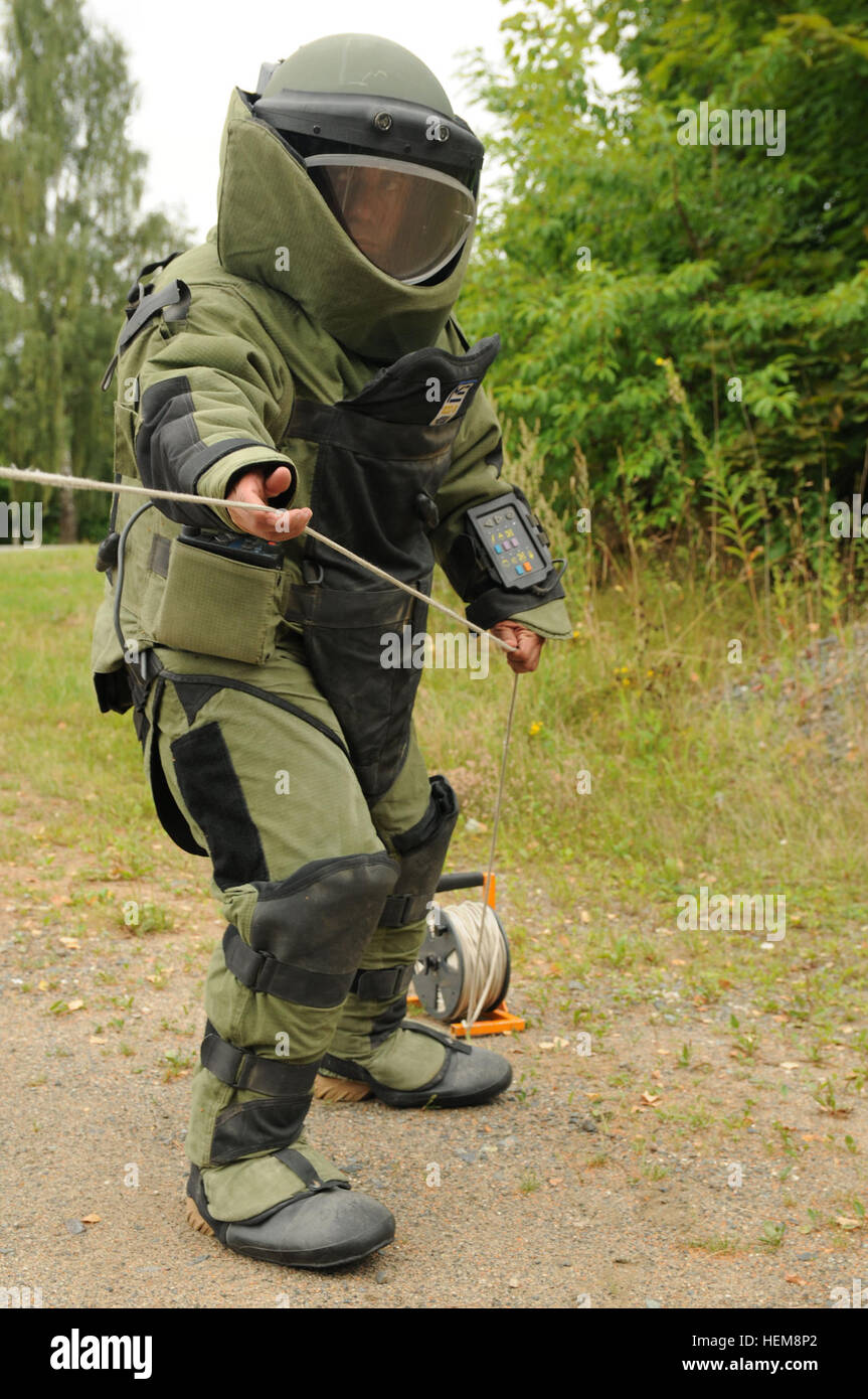 U.S. Army Spc. Earl H. Loria performs explosive ordnance disposal (EOD ...