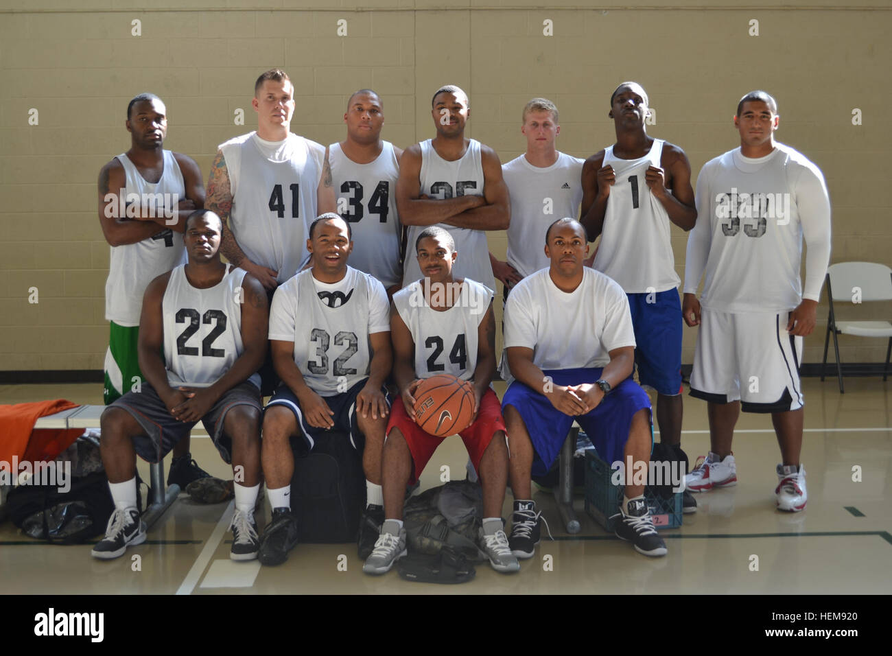 Members of the 2nd Brigade Combat Team basketball team pose for a group ...