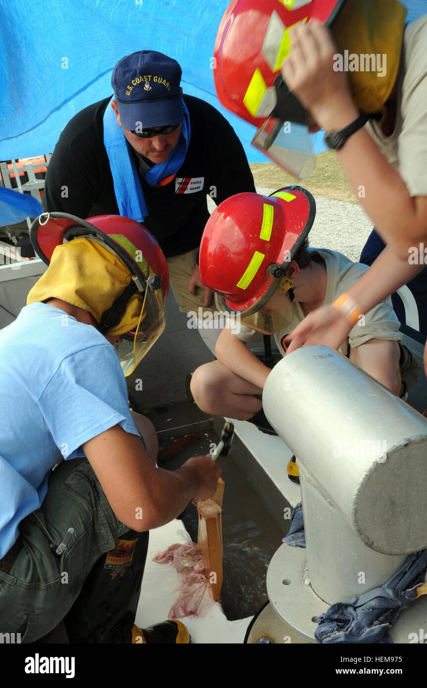 Retired Coast Guard Chief Petty Officer Turner D. Reaves, instructs a ...