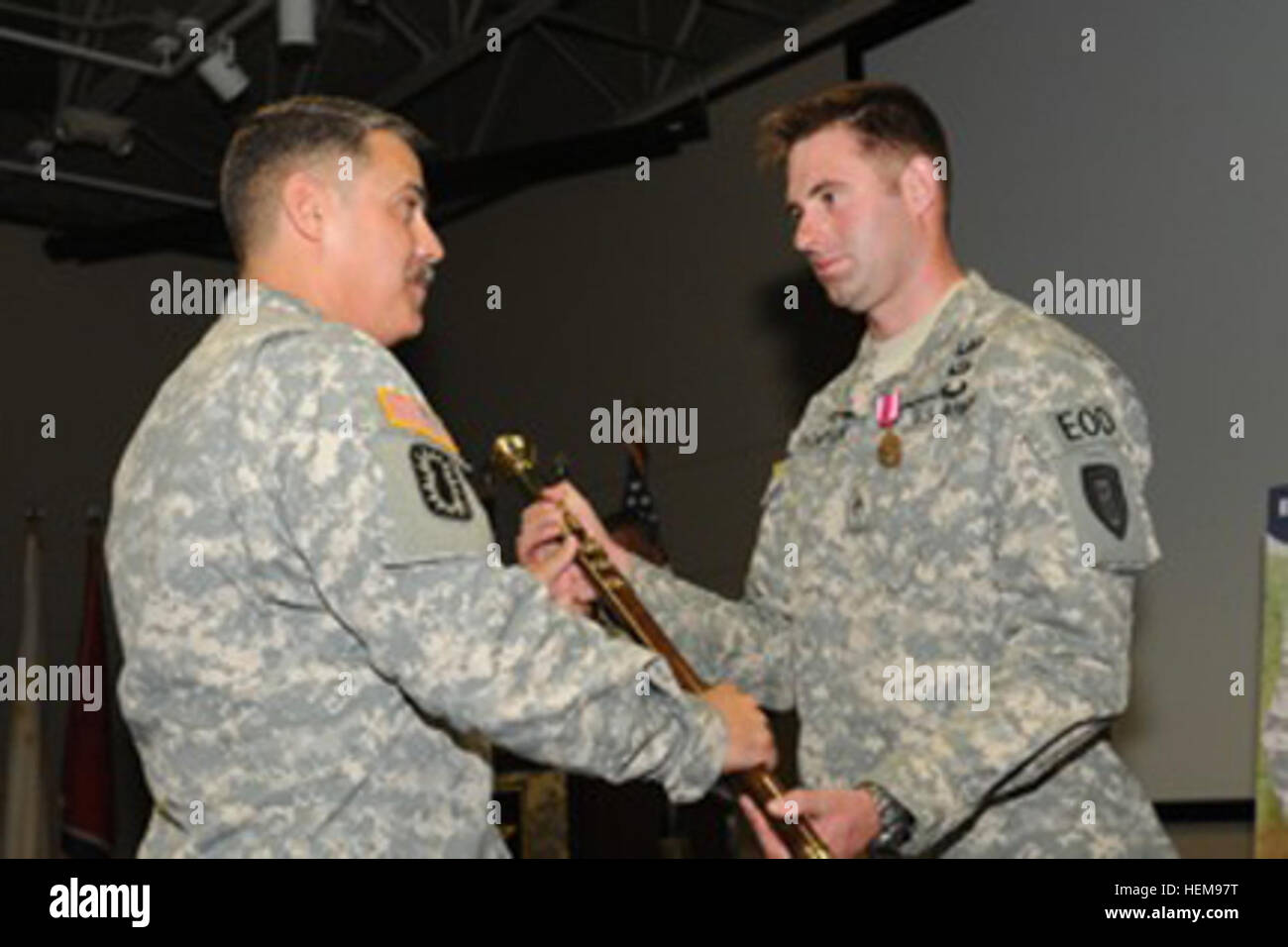 Command Sgt. Maj. David Puig (left), senior enlisted adviser for 20th ...