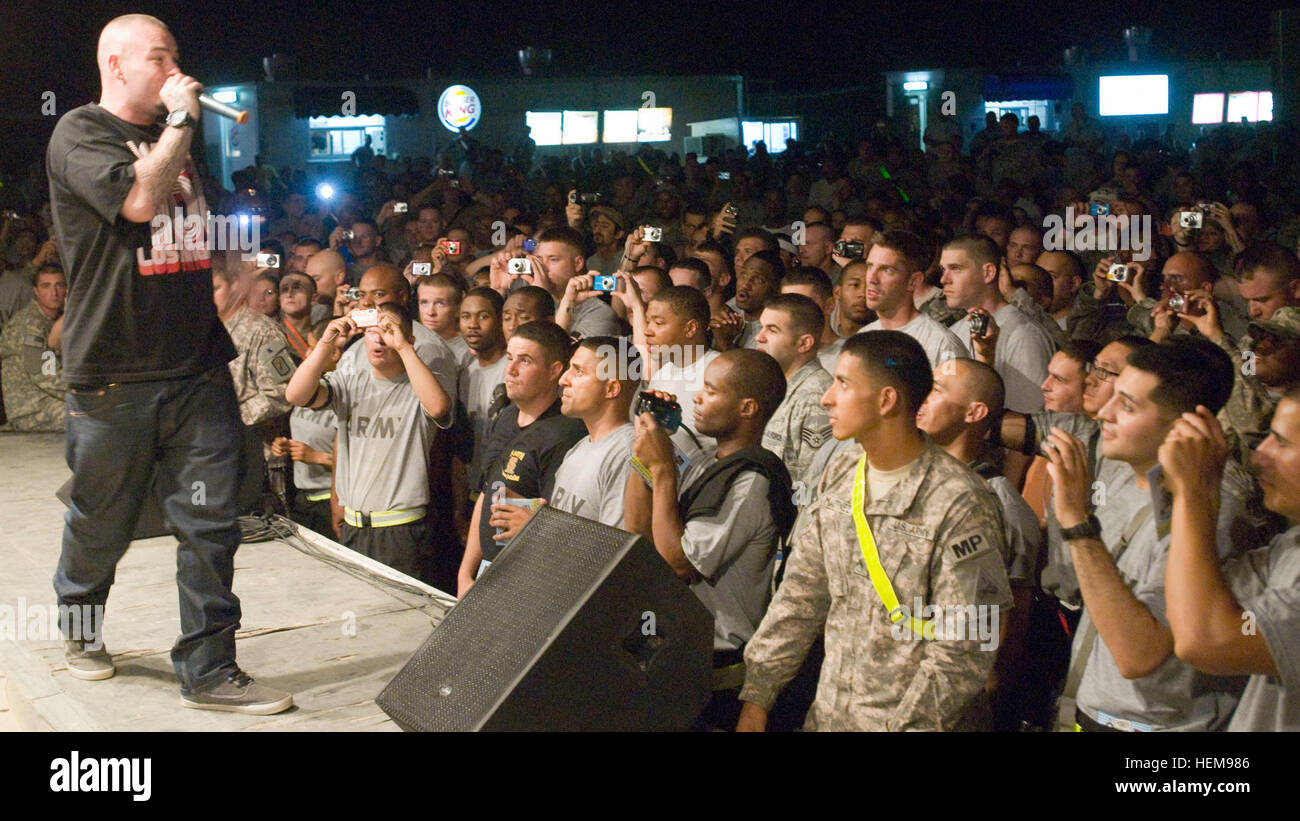 Rapper Paul Wall performs for hundreds of servicemembers during his USO ...