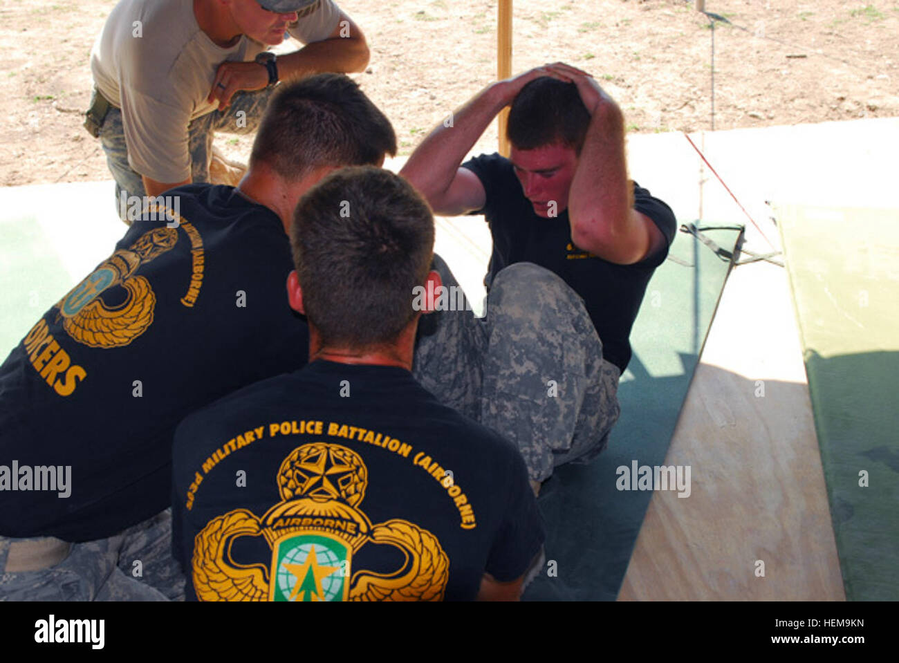 Soldiers on Team Hump move to the sit-up portion during the 65th MP ...