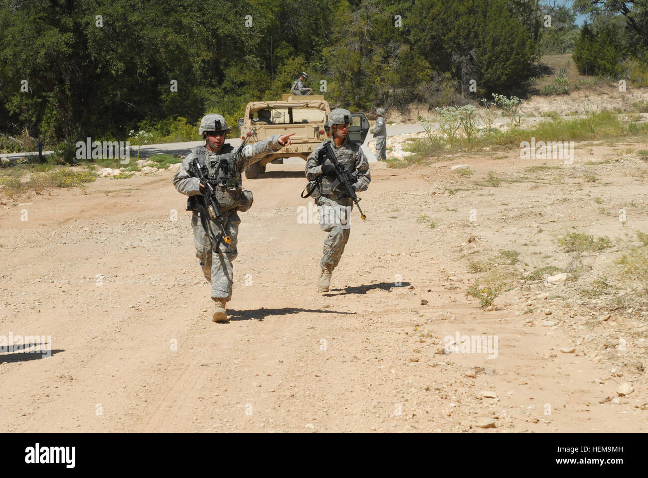 Members of the 81st Civil Affairs Battalion conduct react to an IED ...