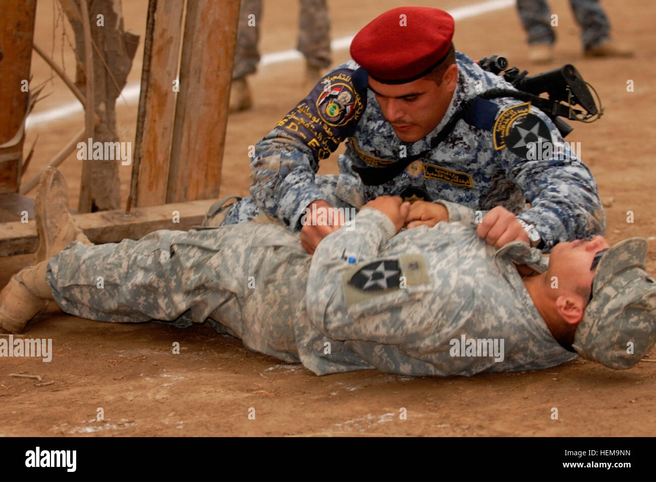 A policeman with the Iraqi Federal Police Explosive Ordnance Disposal ...