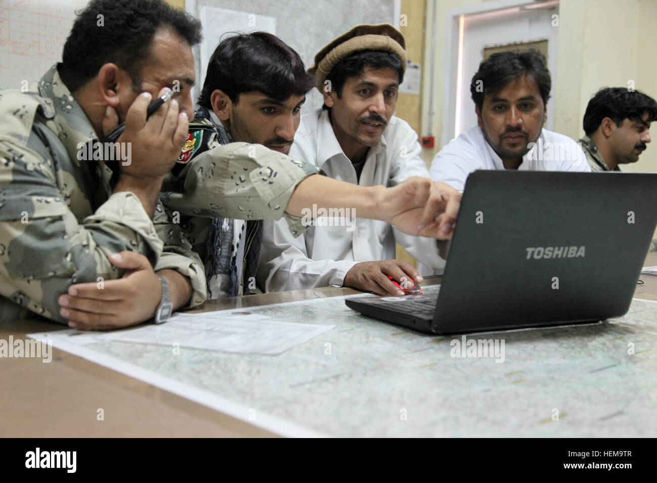 Afghan Border Police practice using Microsoft Excel in a computer class ...