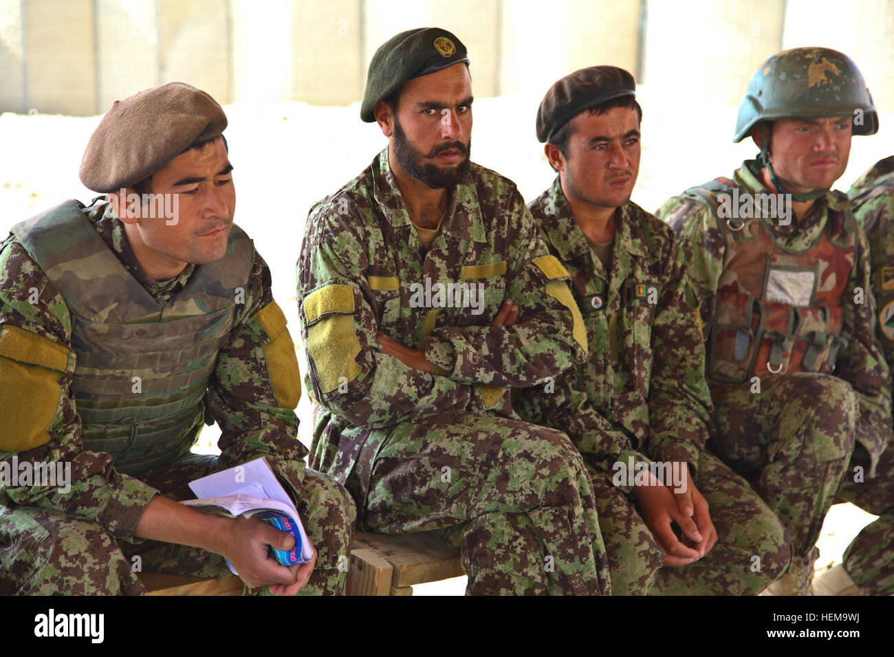 Afghan National Army (ANA) soldiers learn the different types of ...