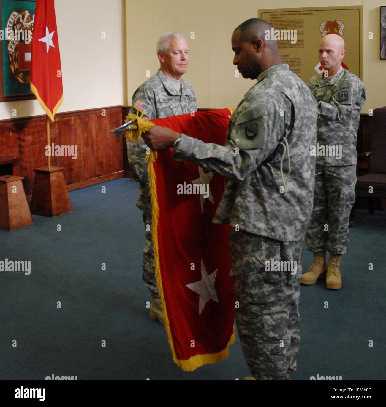 A U.S. Army general receives the general officer’s flag during a ...