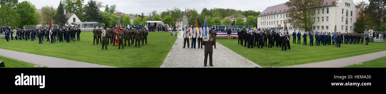 The formation of troops and the color guard await the official party's ...