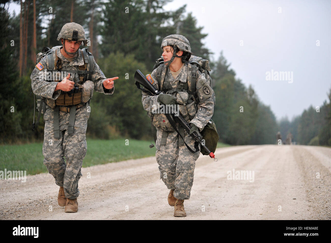 An U.S. Army medic (right), assigned to Europe Regional Medical Command ...
