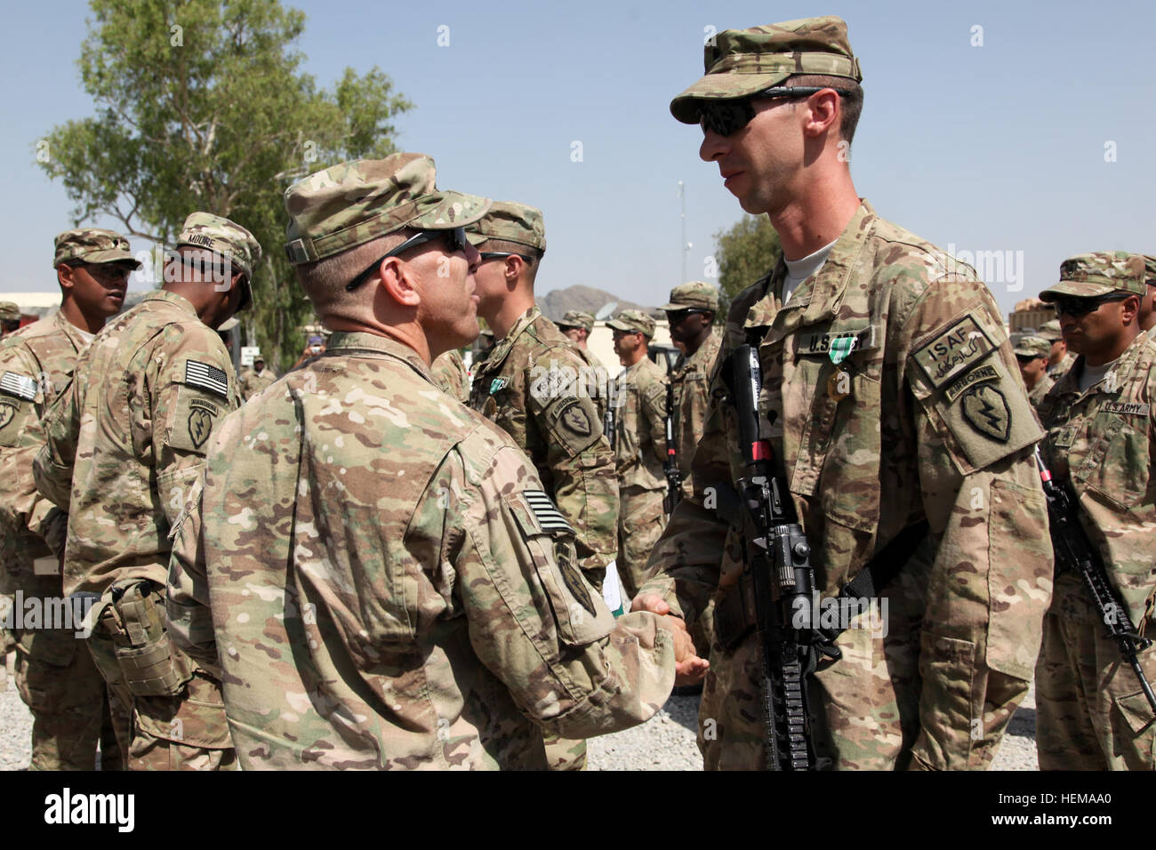 U.S. Army Spc. Adam Behrend, assigned to Alpha Battery, 2nd Battalion ...