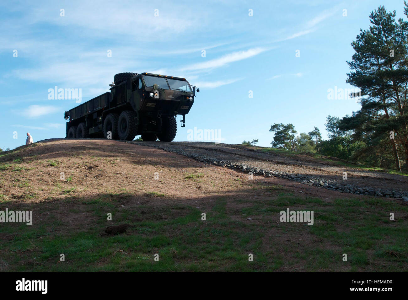 Soldiers drive a Heavy Expanded Mobility Tactical Truck, or HEMTT ...